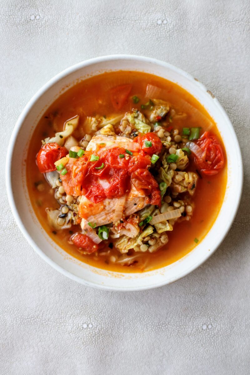 Tomato Poached Salmon with Charred Cabbage Couscous - Everyday Delish
